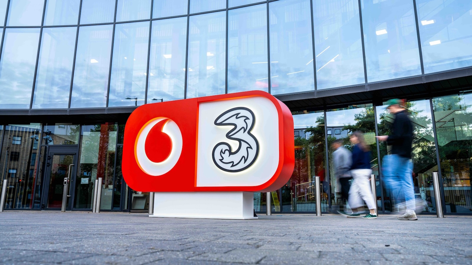Vodafone completes Three merger creating UK's biggest mobile phone ...